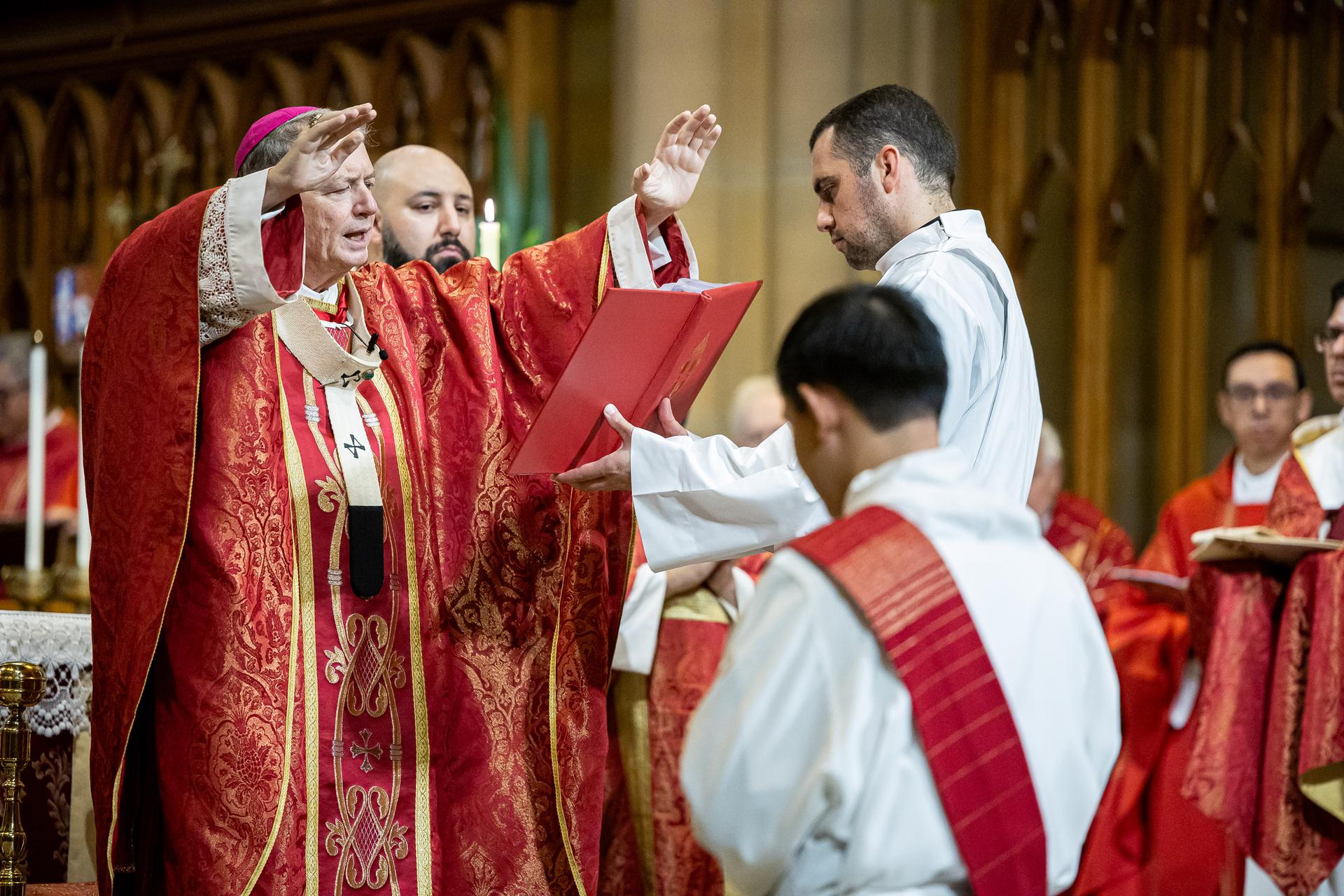 Archbishop Anthony Fisher OP singing the Prayer of Ordination. Photo ...