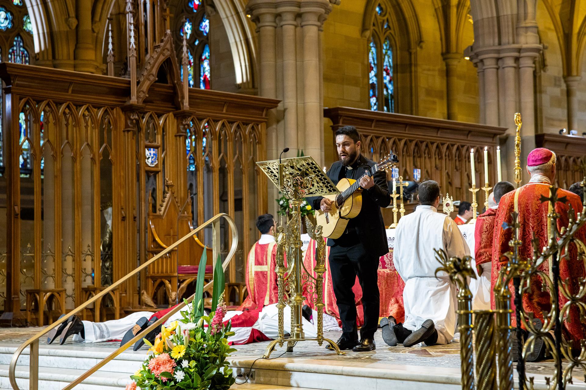 Our seminarian Giovanni singing the Litany of Saints.